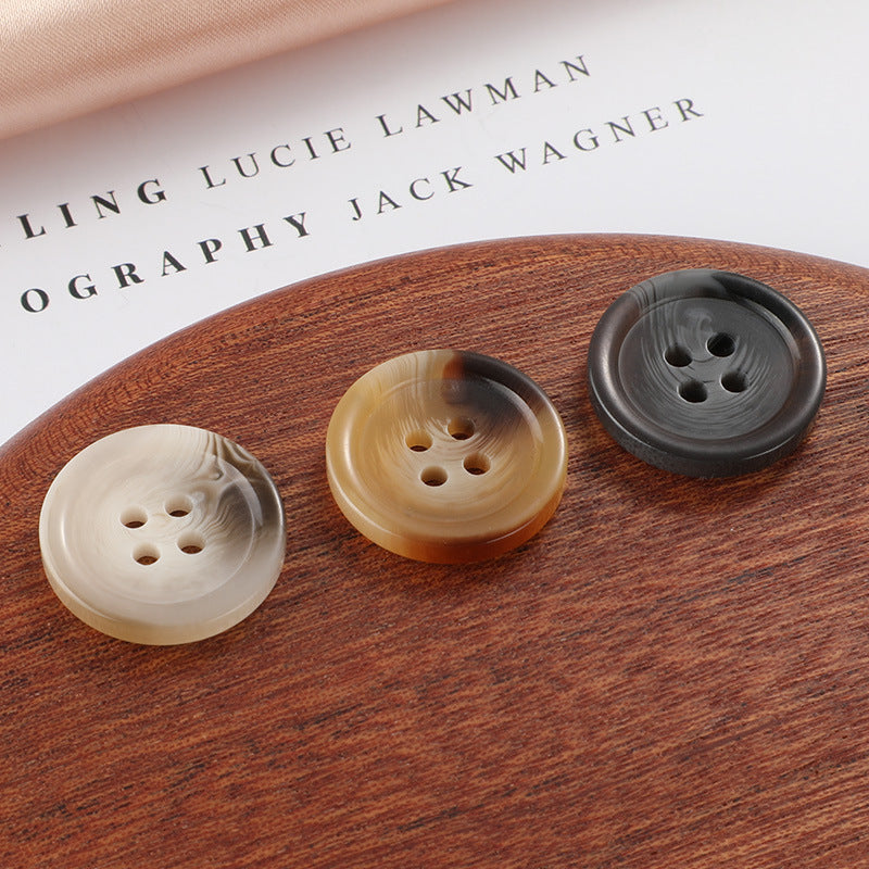 Rasin polyester 4H button with thin RIM – www.jimmybuttons.com.au