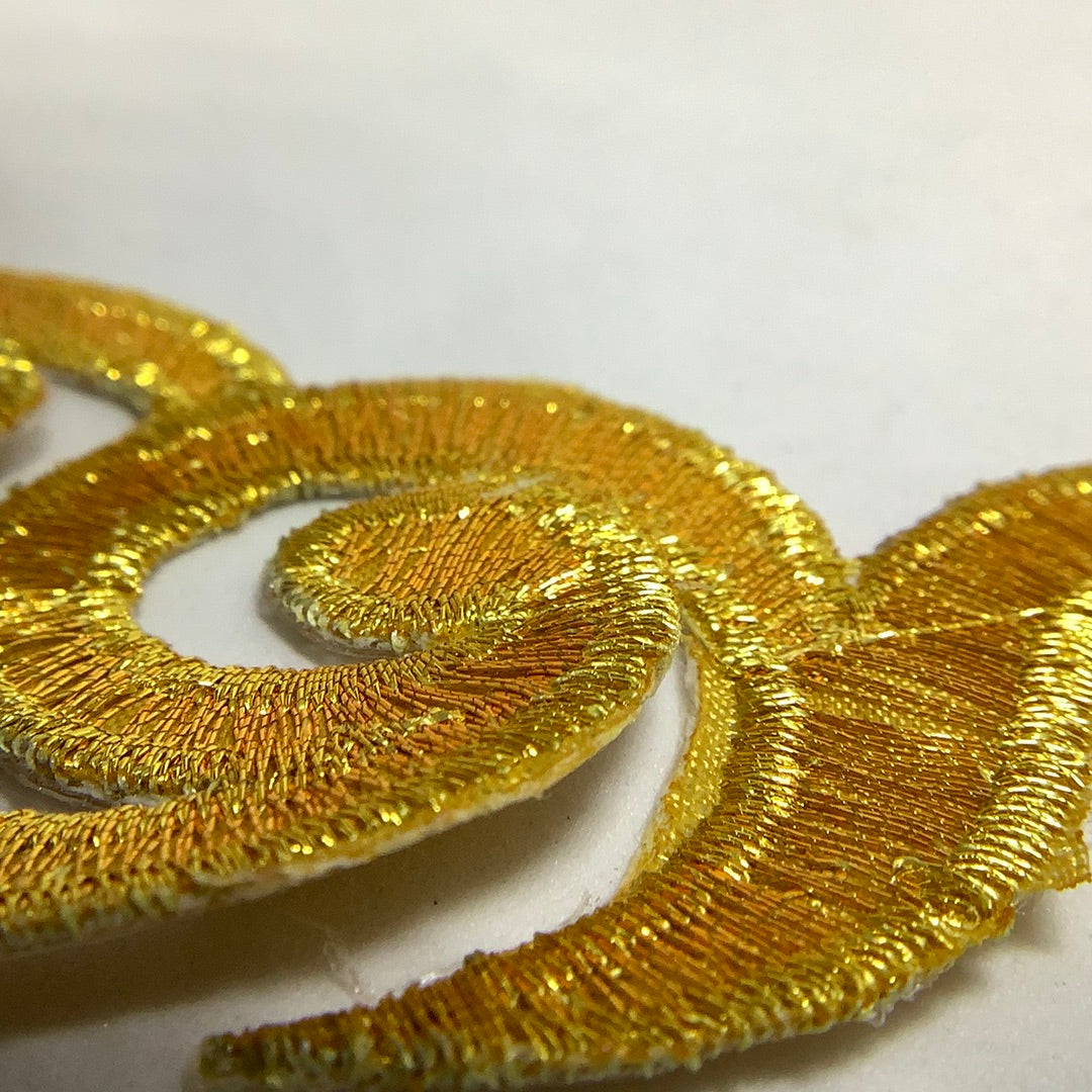 Cornelli Scroll Motif – www.jimmybuttons.com.au